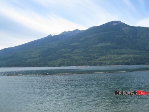 36 A tug works log booms out on Lower Arrow Lake, view from Nakusp ...